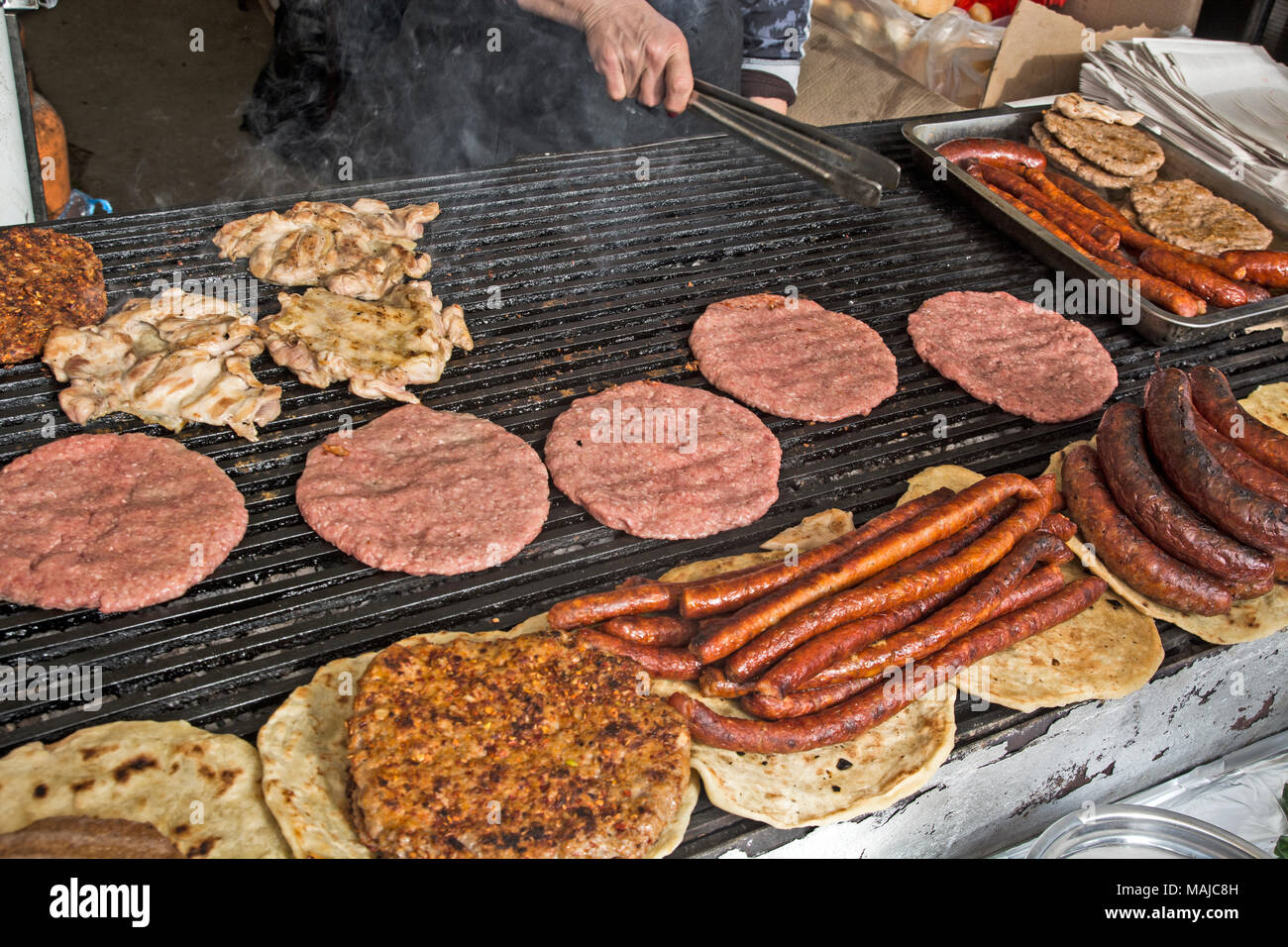 Freshly prepared and grilled meats roasted on offer to customers Stock ...