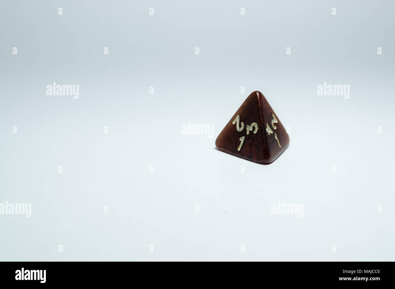 red four-sided dice, isolated on a white background. Dice of role ...