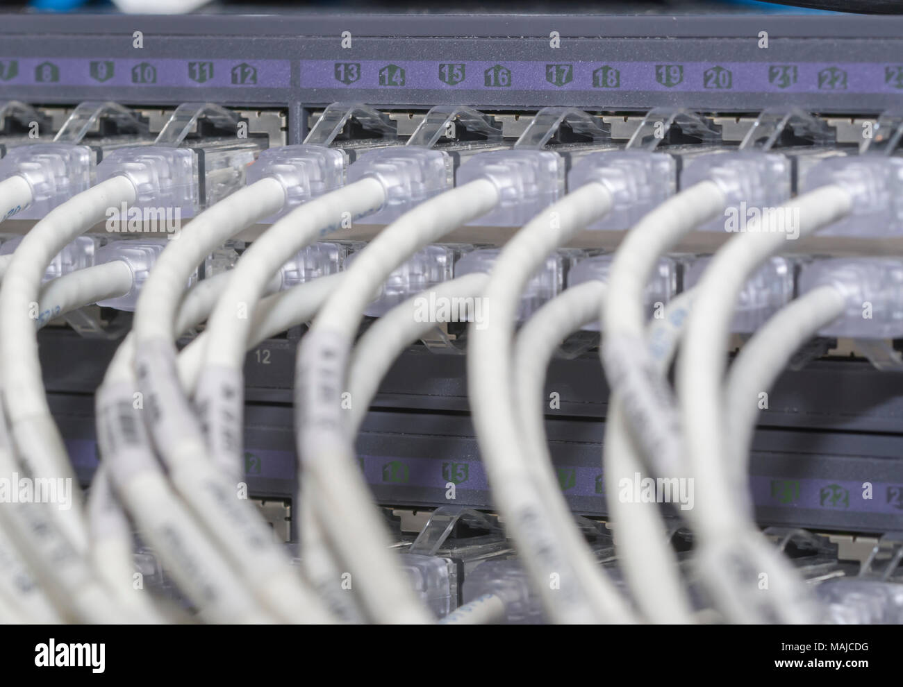 Network cables and servers in a technology data center Network cables ...