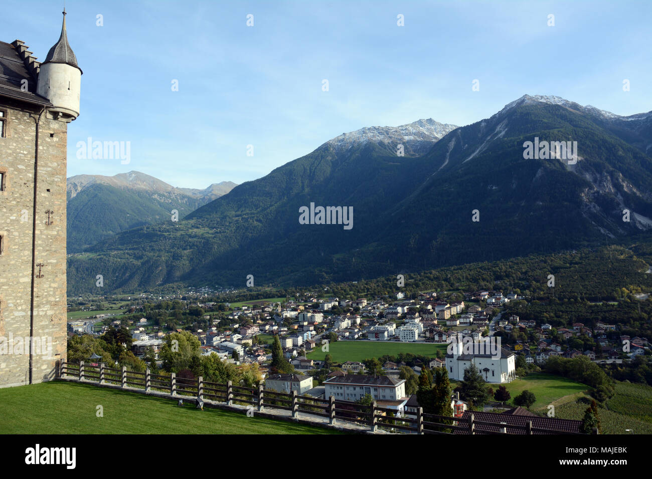 The edge of the Schloss Leuk castle in the city of Leuk, below the ...