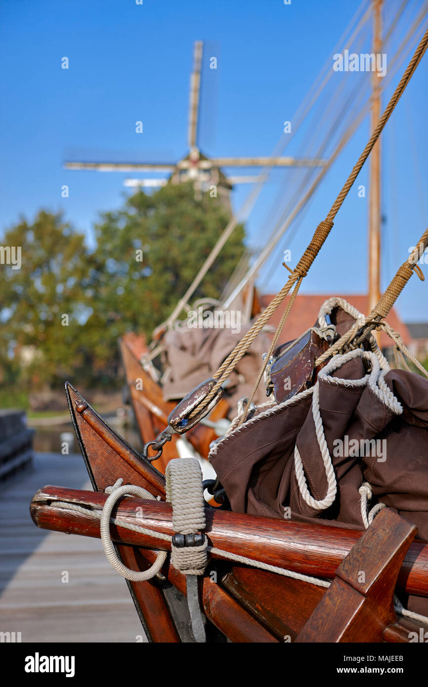 Traditional Dutch Sailing Tjalk, Windmill, Trees and Buildings in the ...