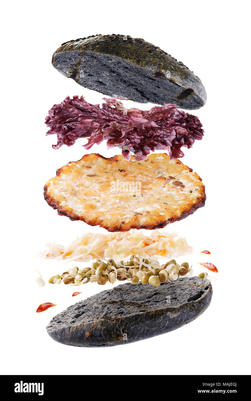 Classic burger ingredients flying on Cut Out Stock Images & Pictures ...
