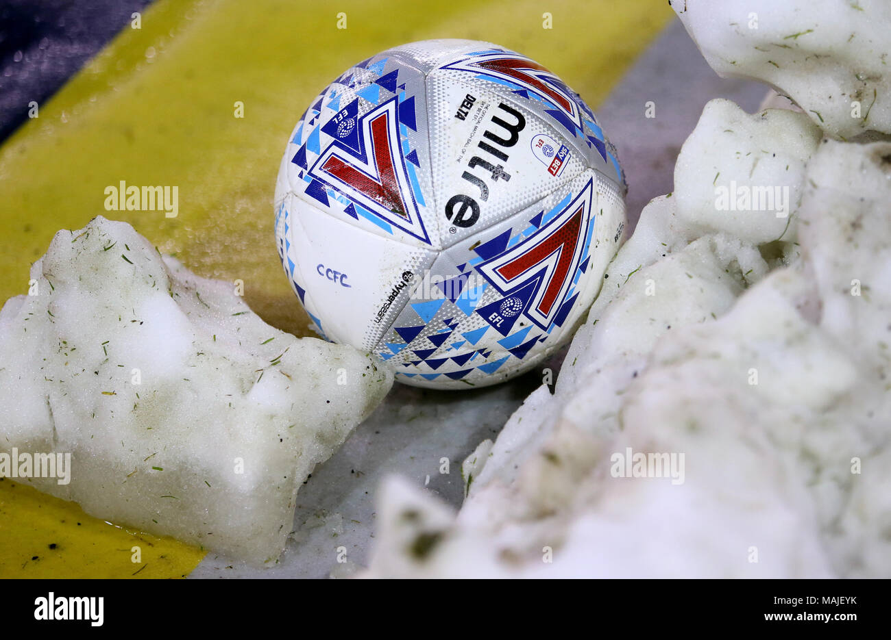 A general view of a Mitre match ball hitting the snow at the side of ...