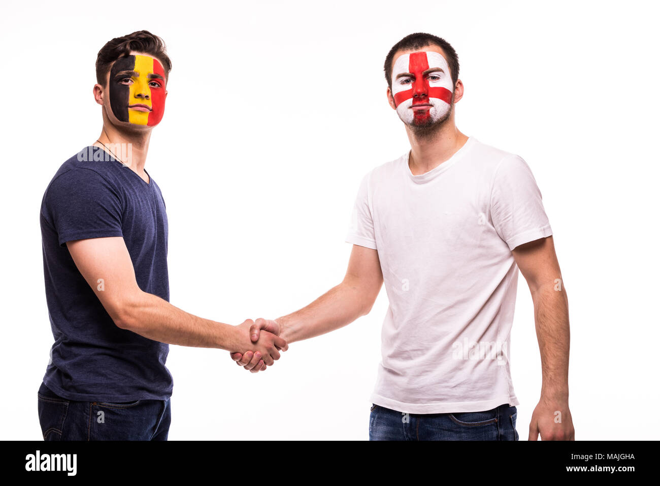 Football fans of Belgium and England national teams with painted face ...
