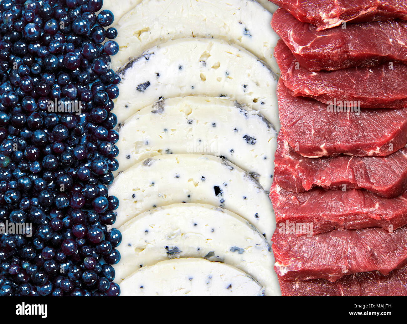 french flag, collage from blackcurrants, blue cheese and fresh meat ...