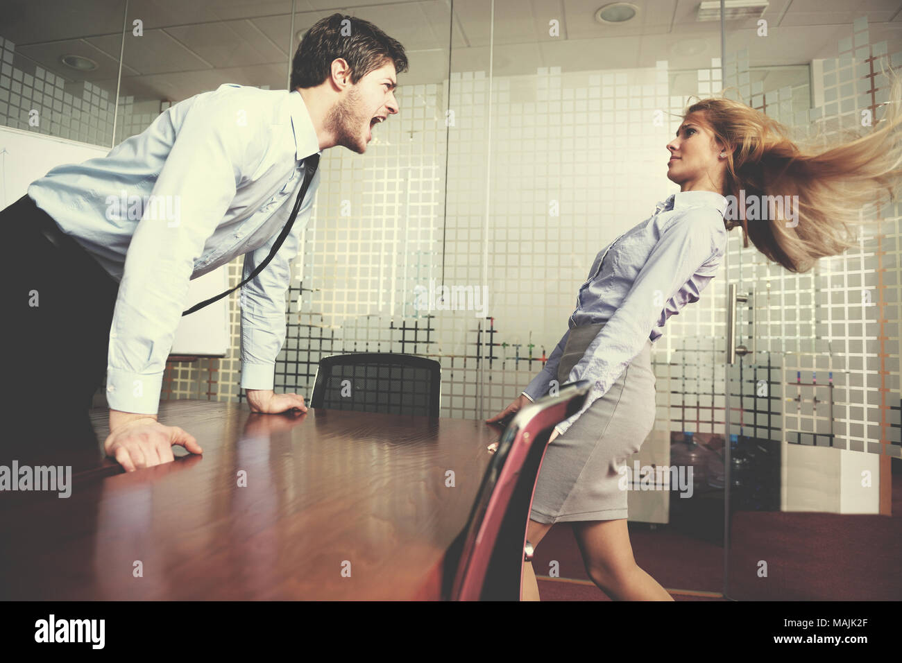 Angry business man screaming at employee in the office Stock Photo - Alamy