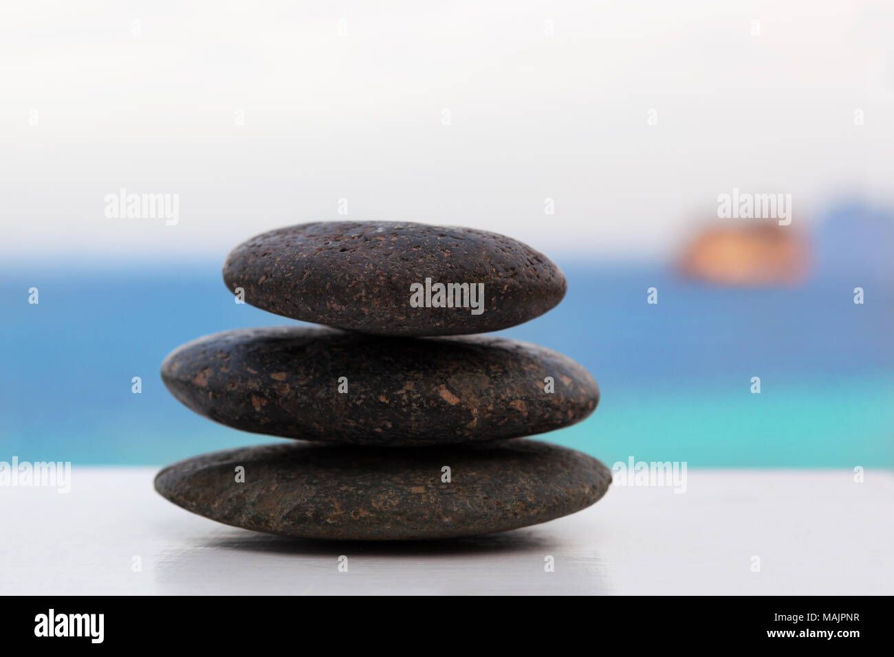 Zen rock stack on tropical beach. Zen, simplicity, spirituality and ...