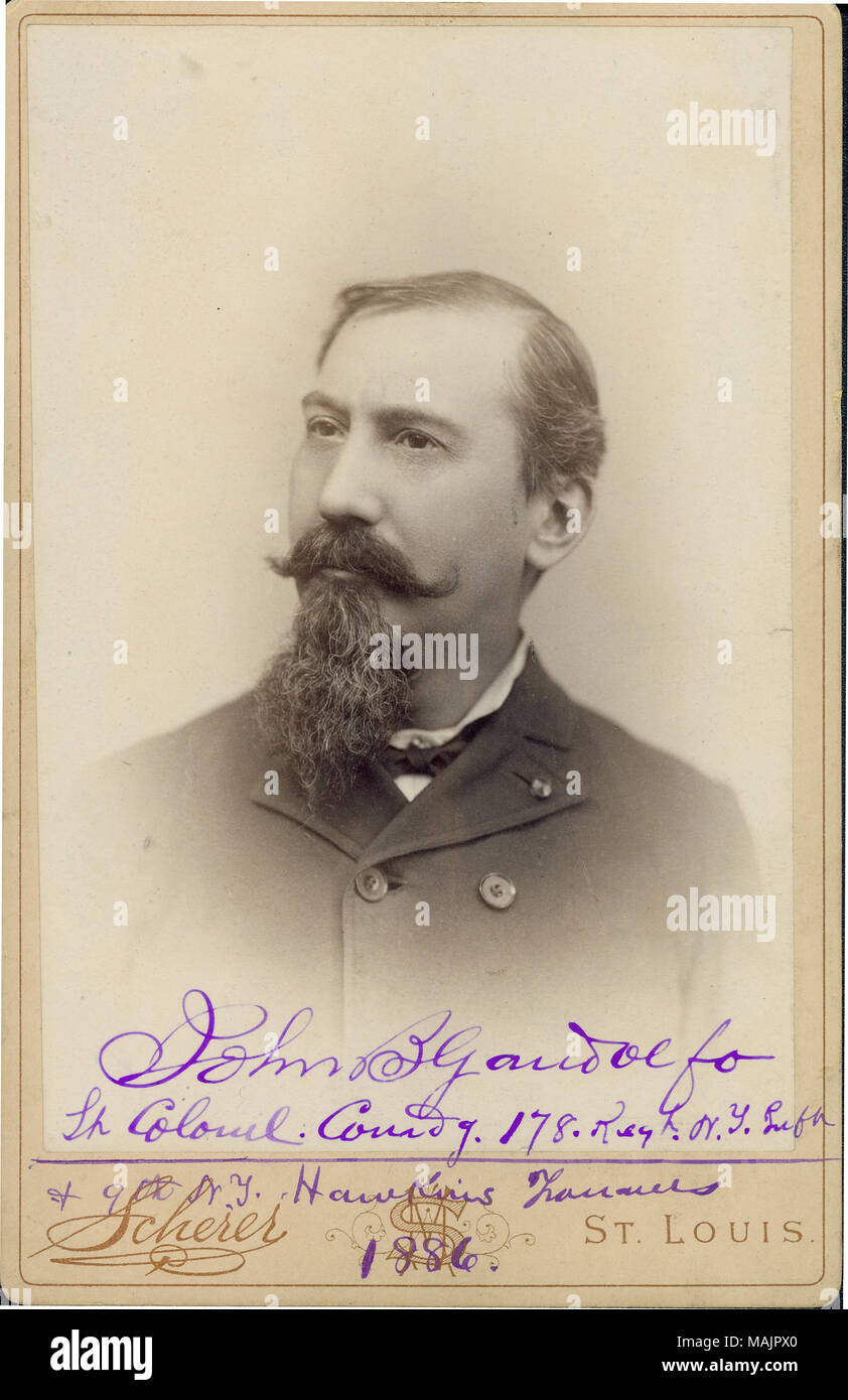 Bust portrait of Lieutenant Colonel John B. Gandolfo wearing a civilian ...