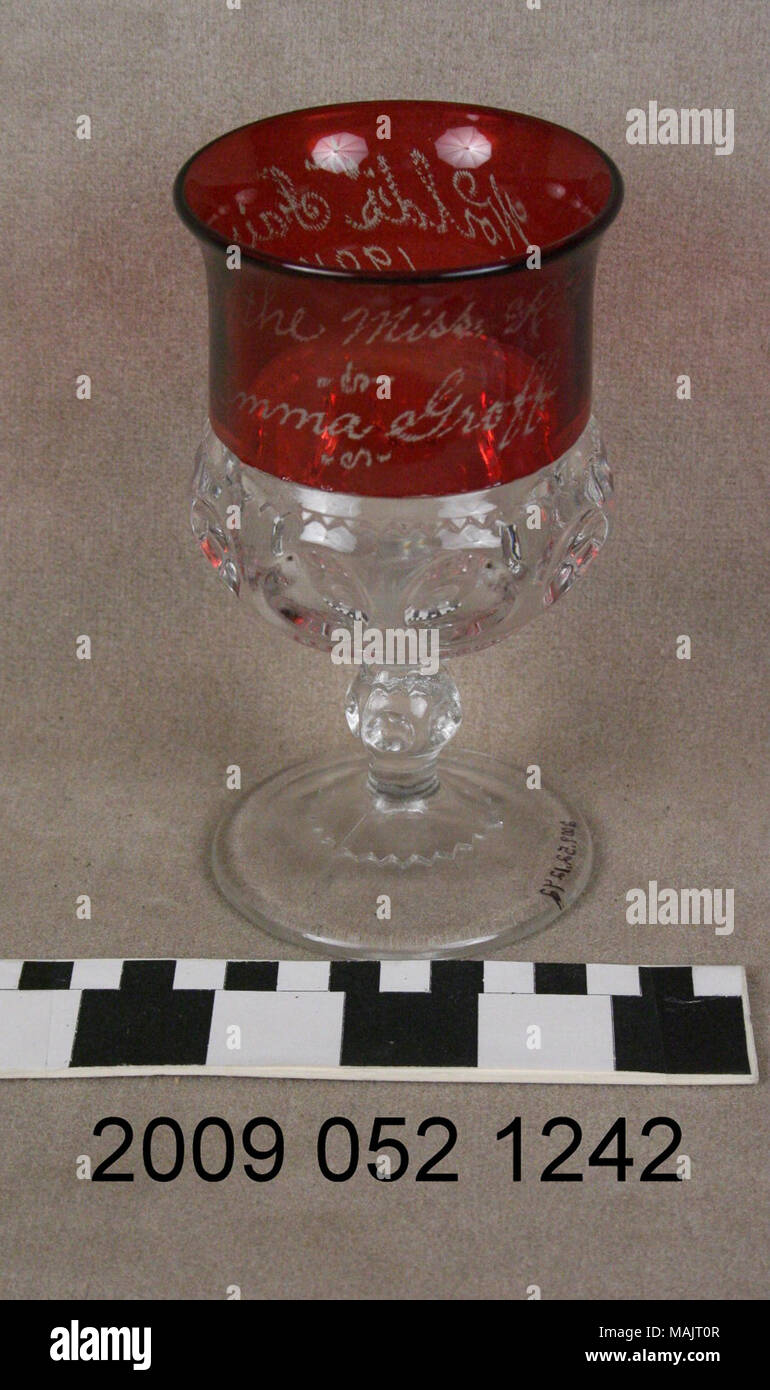 Ruby flash wine goblet has thumbprint pattern on the lower half of the ...