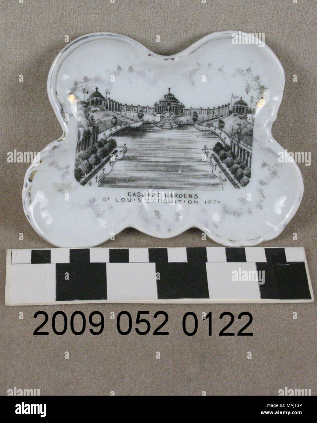 White ceramic pin tray is butterfly shaped with gilt d+?cor and black ...