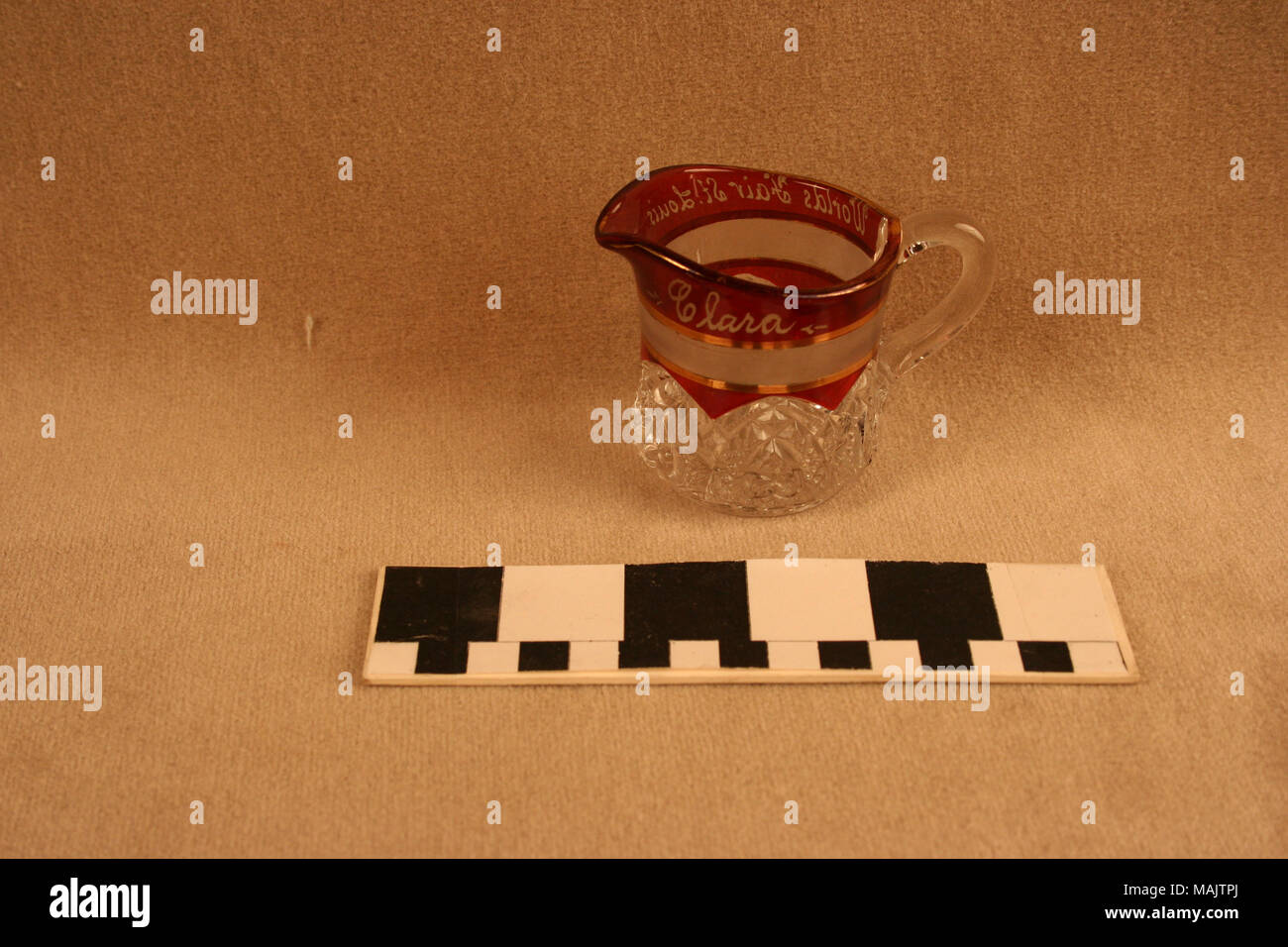 Ruby stained creamer has pressed heart band design, frosted band ...