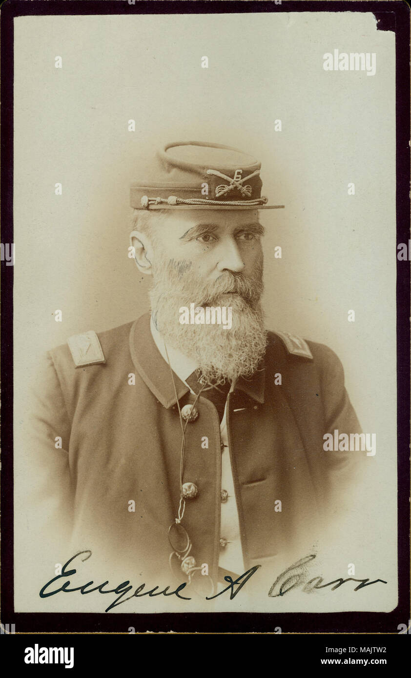 Portrait of Eugene A. Carr dressed in a Union uniform and hat. A pair ...