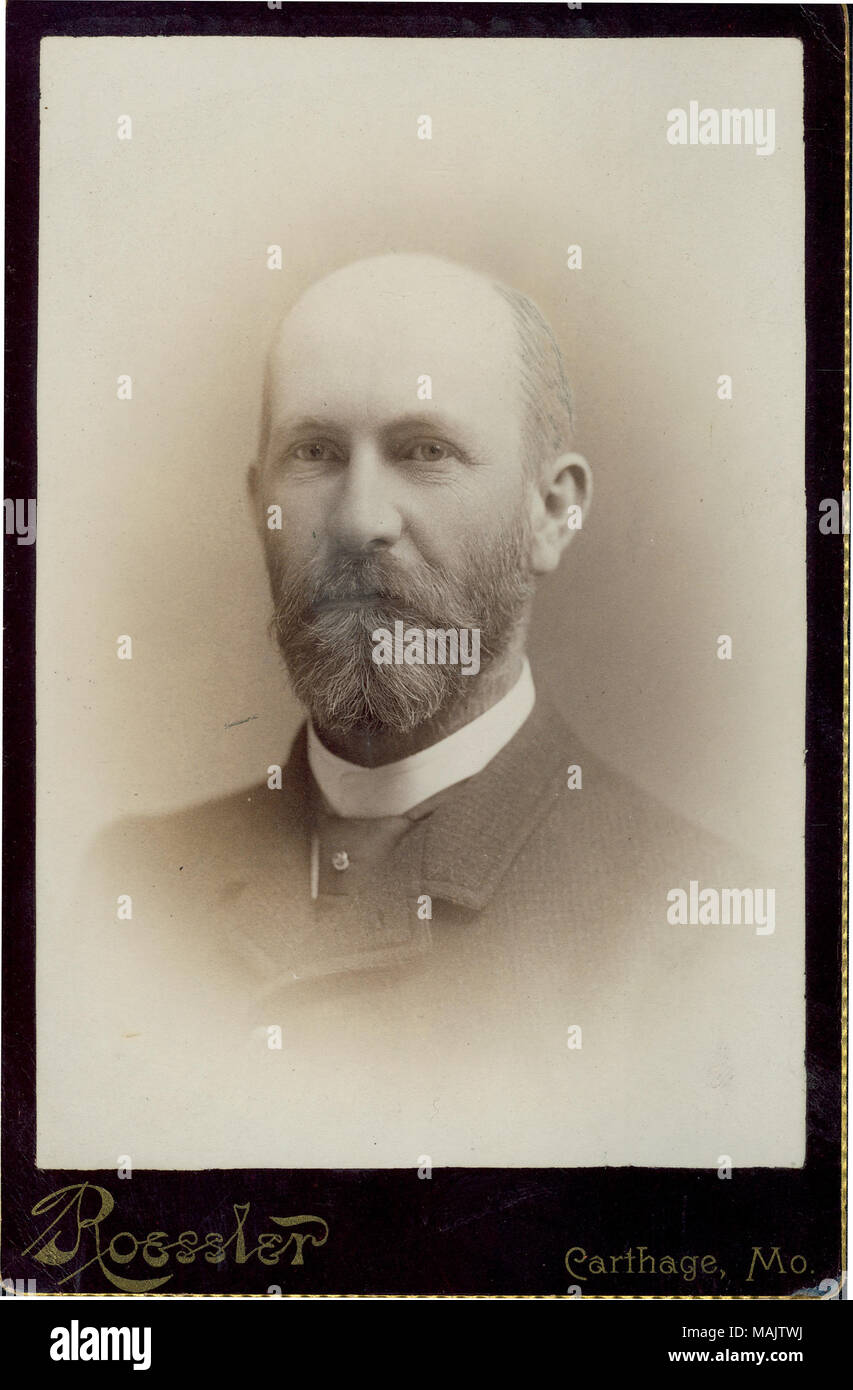 Bust portrait of Joseph L. Moore wearing a suit, and turned slightly to ...