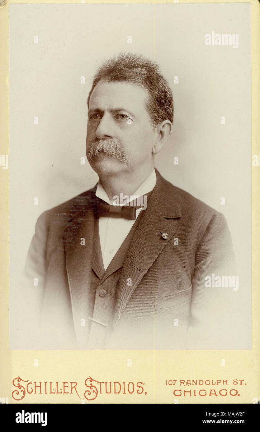 Bust portrait of William R. Prickett wearing a suit, vest, and bow tie ...
