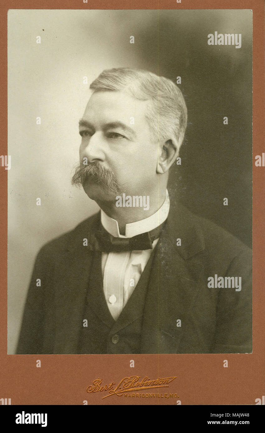 Bust portrait of Andrew G. Deacon wearing a suit, vest, and bow tie ...