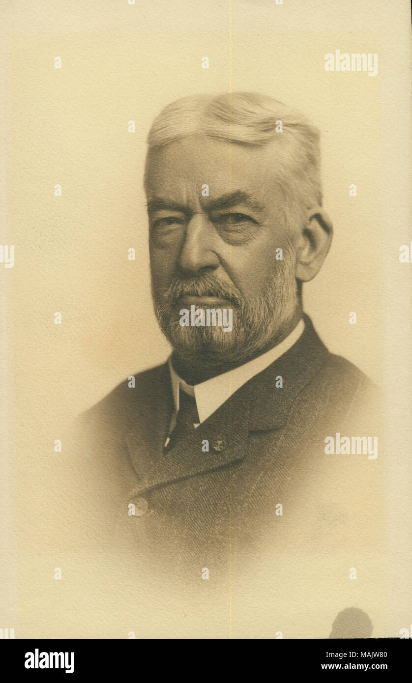 Bust portrait of Andrew G. Deacon wearing a suit and tie, and turned ...
