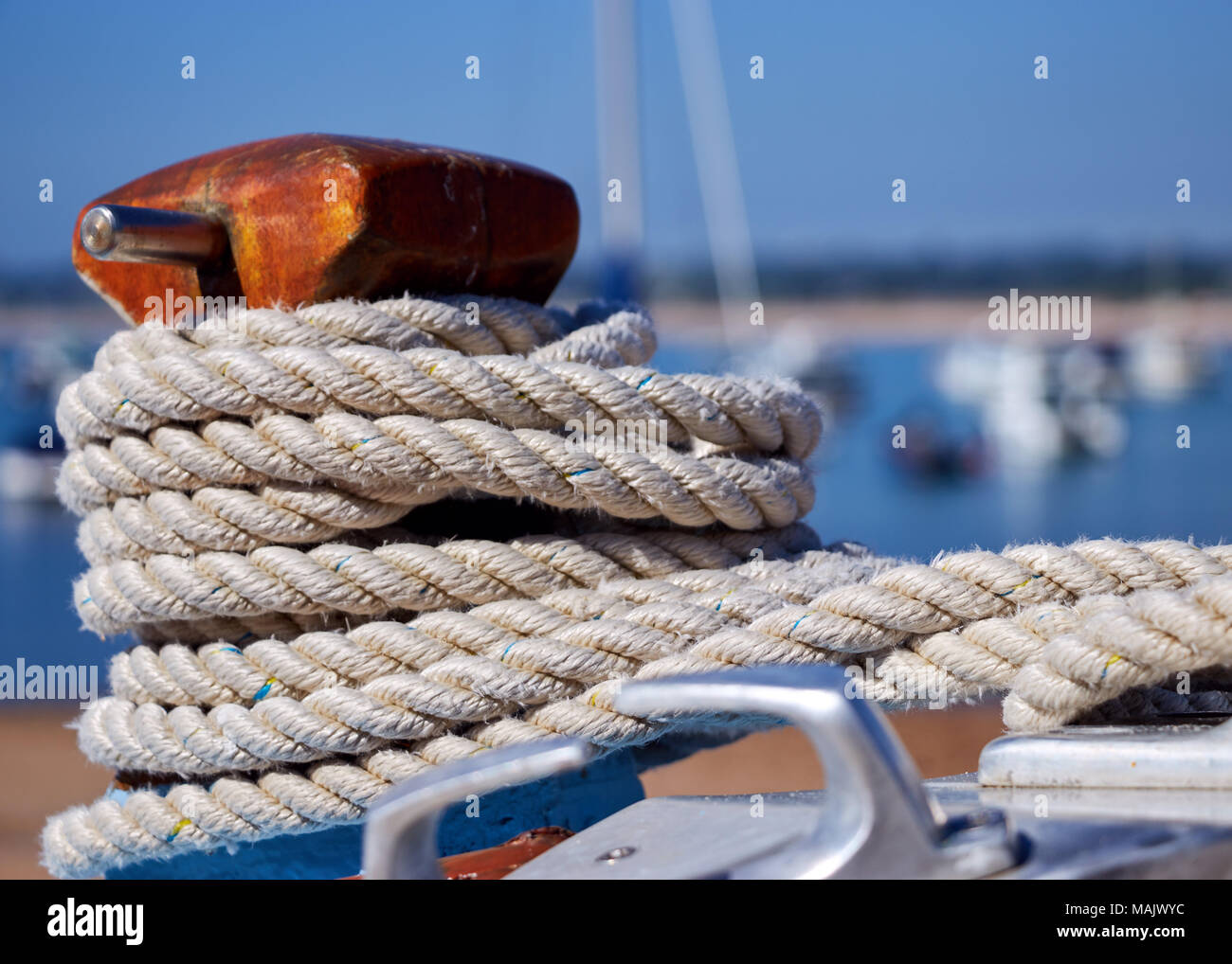Abstract image of a boat bollard with rope Stock Photo - Alamy