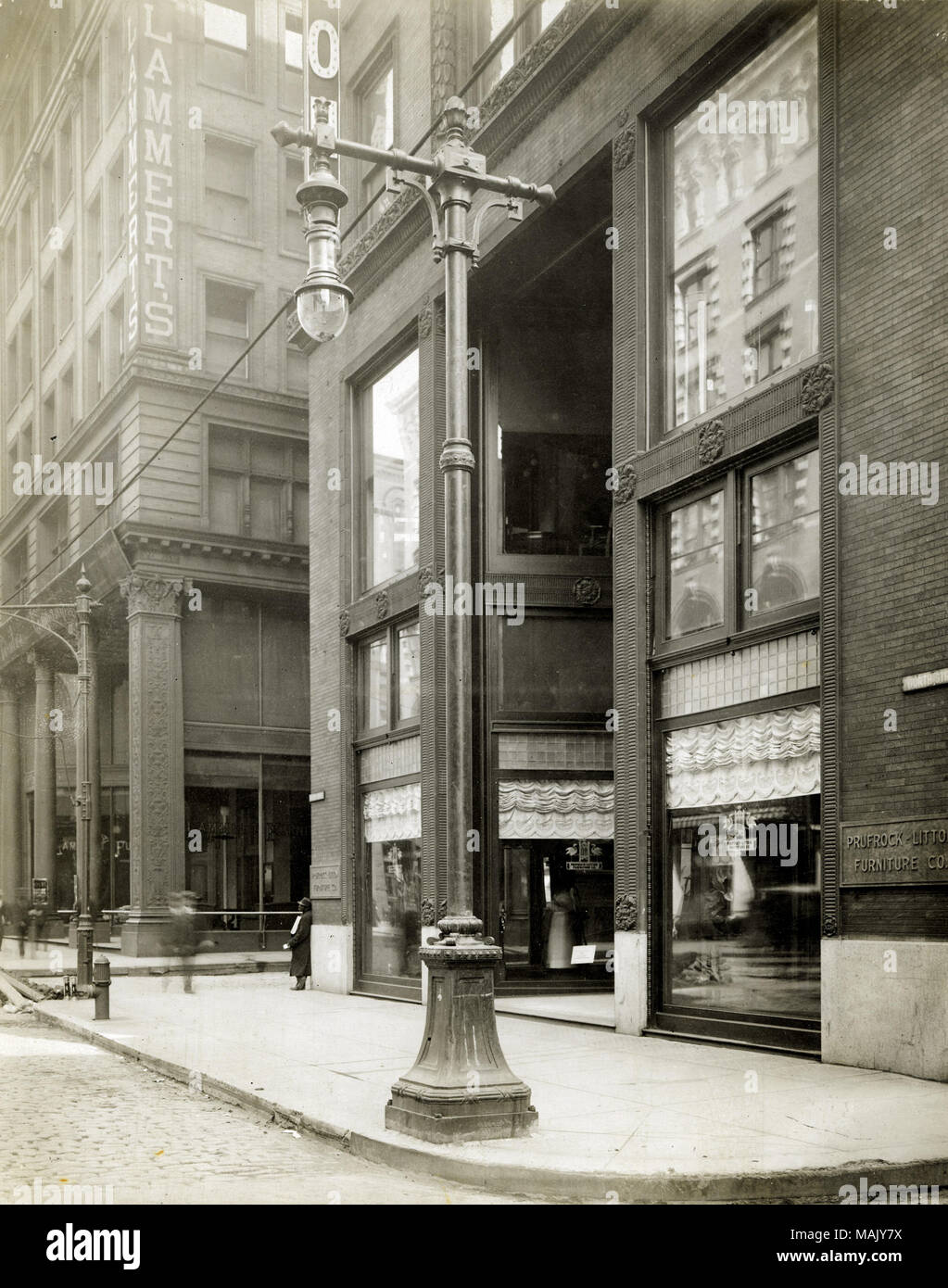 Title: Lighting fixture in front of Prufrock-Litton Furniture Company ...