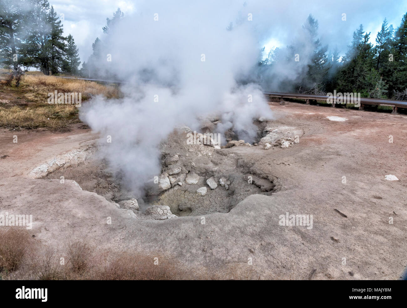 Steam vents in Yellowstone National Park with steam coming out of the ...