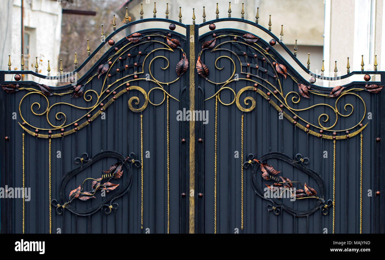 wrought-iron gates, ornamental forging, forged elements close-up Stock ...