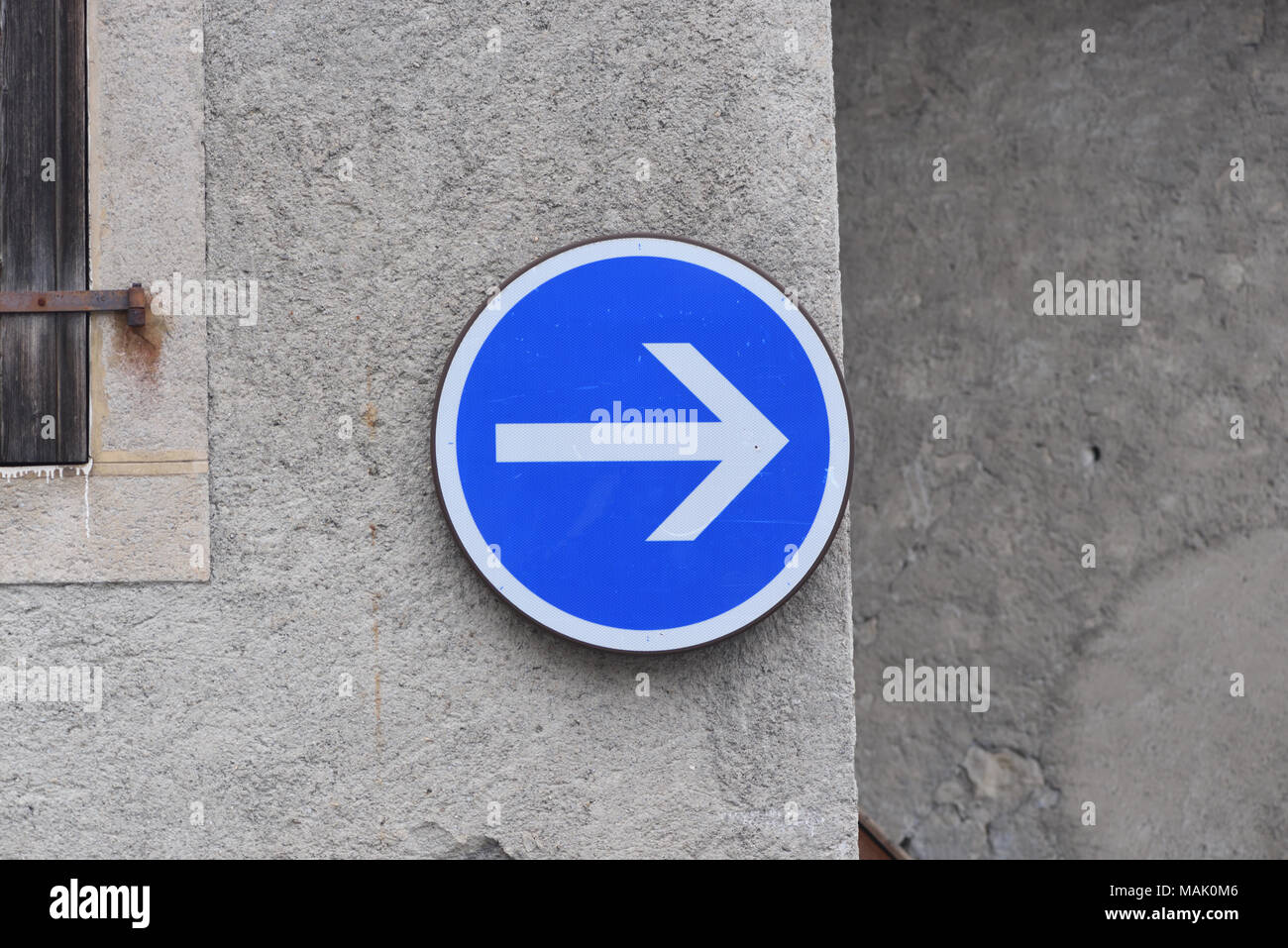 Blue traffic sign white arrow hi-res stock photography and images - Alamy