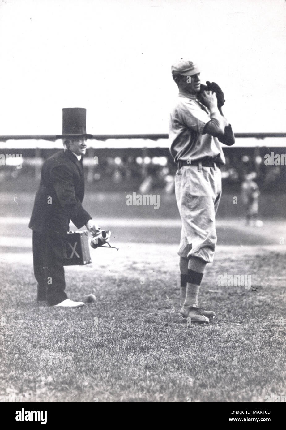 Title: Clown behind Pirates pitcher, probably Claude Hendrix, at ...