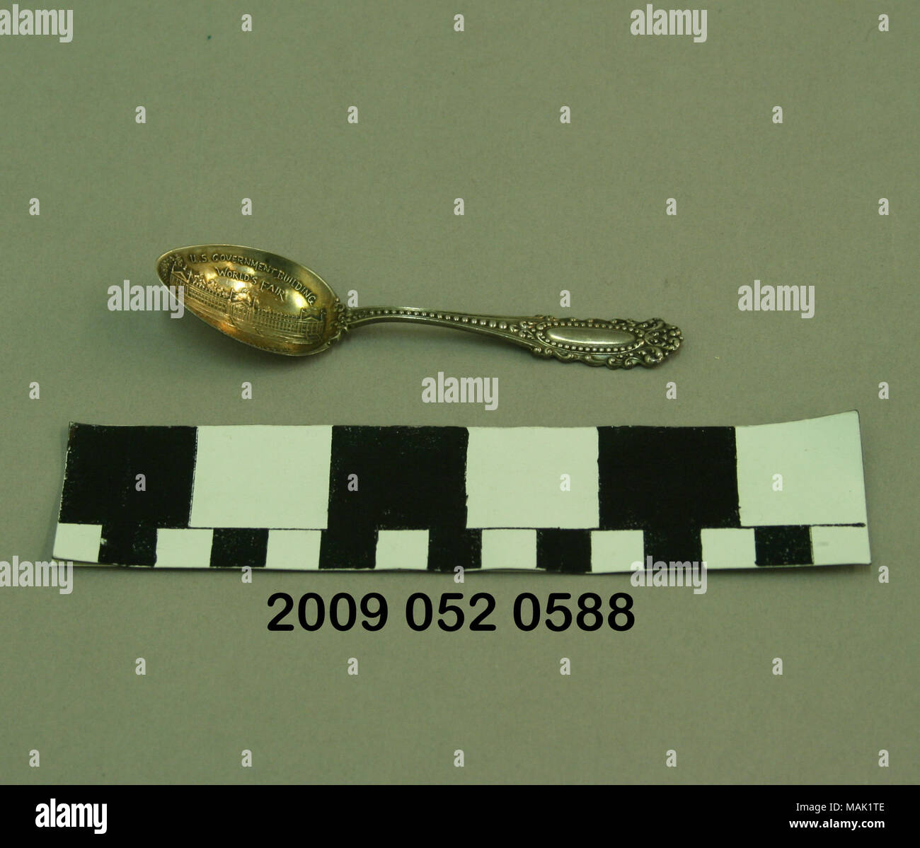 Silver demitasse spoon by Mechanics Sterling Company with relief view ...
