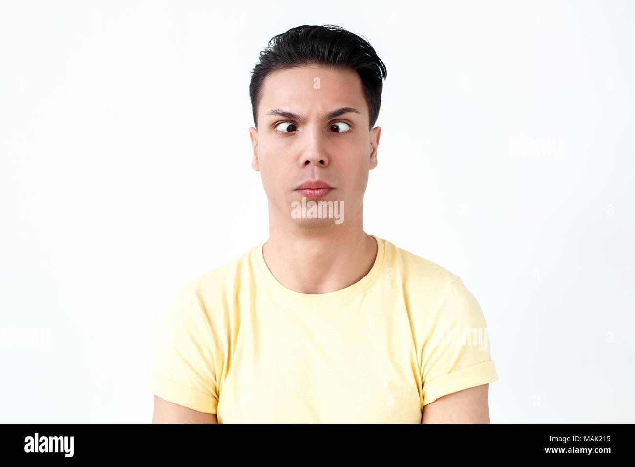 Portrait of crazy and funny idiotic man with stupid eyes. Emotions and ...