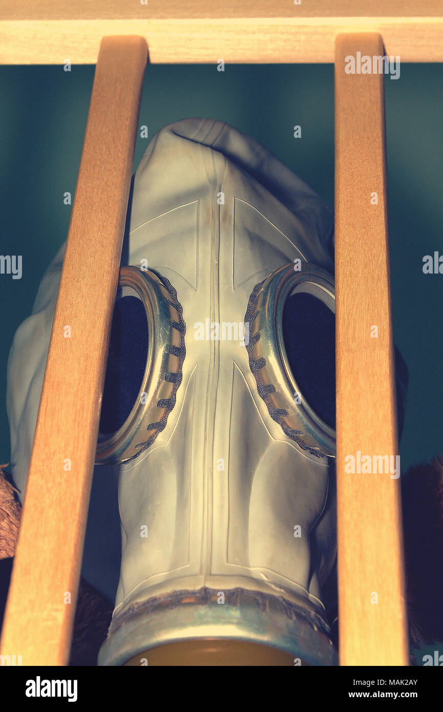 A toy in a gas mask as a concept for protecting children from the use ...