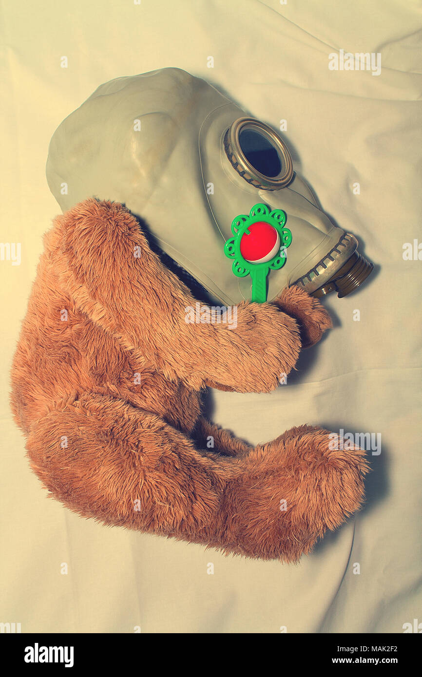 A toy in a gas mask as a concept for protecting children from the use ...