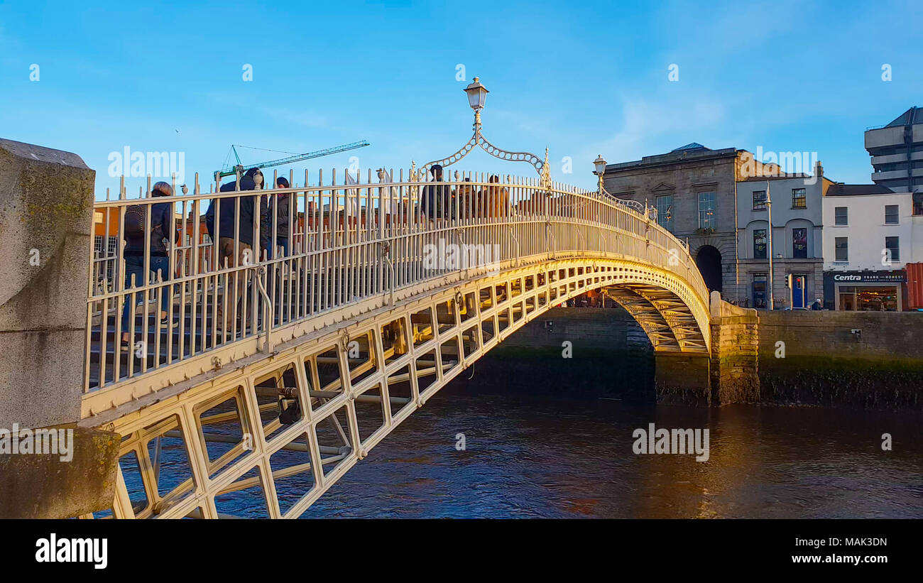 Most famous bridge in Dublin - the Ha'Penny Bridge over River Liffey ...
