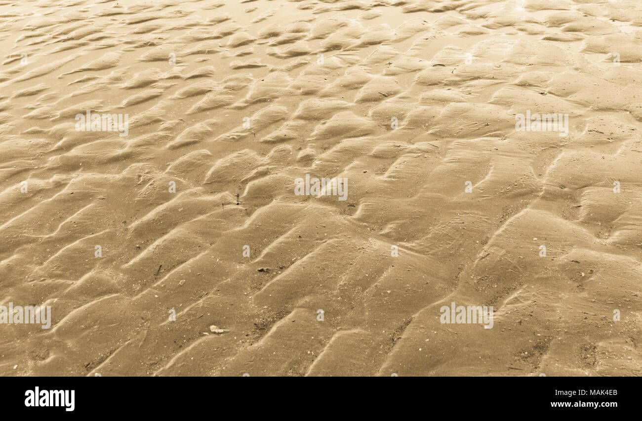 Natural pattern created by waves on sandy Mackenzie Beach in Tofino, BC ...