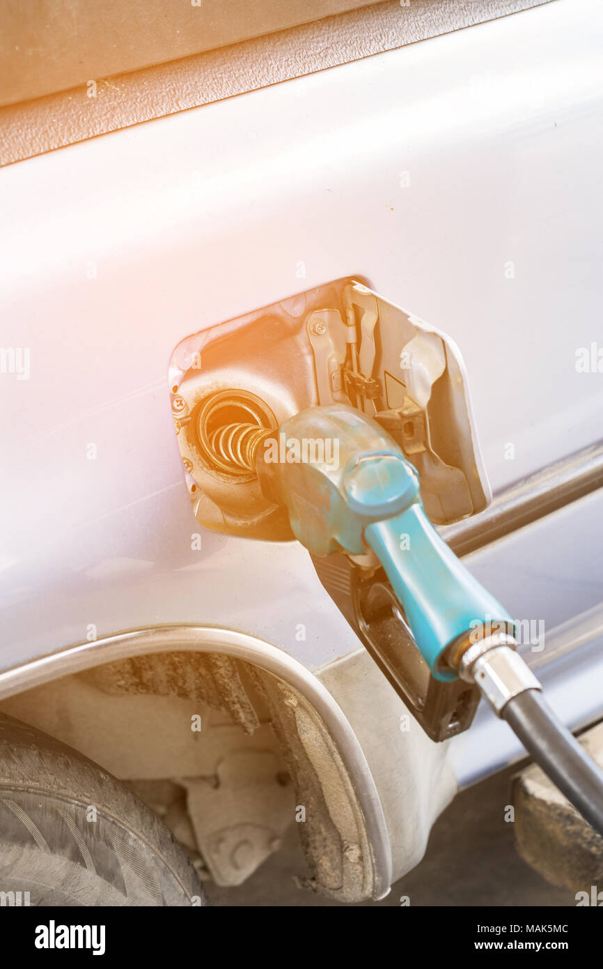 Closeup of pumping gasoline fuel into car tank Stock Photo - Alamy