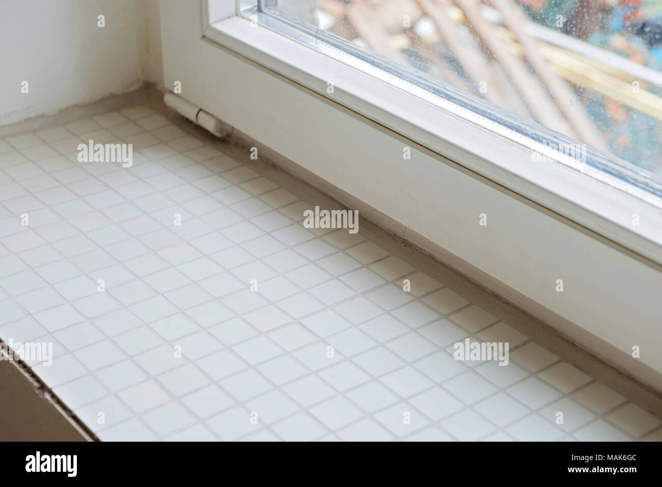 Window sill from mosaic tiles during renovation Stock Photo - Alamy