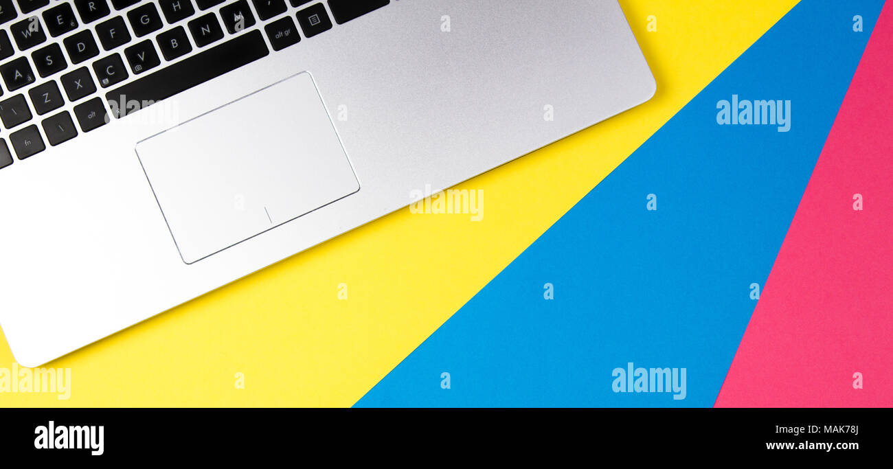Top view of laptop computer on colorful background Stock Photo - Alamy