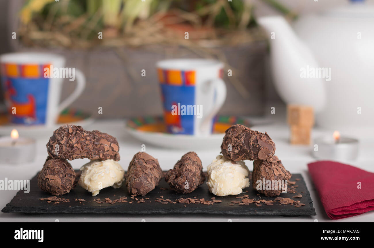homemade variety of chocolate truffles on a plate with coffee Stock ...