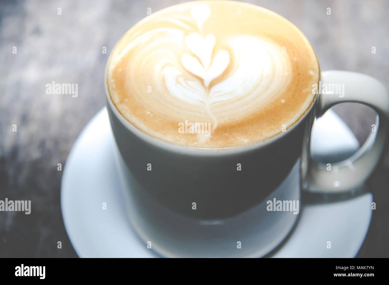 Cup of coffee with beautiful Latte art Stock Photo - Alamy