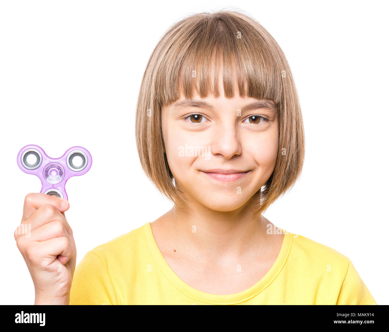 Little girl with spinner toy Stock Photo - Alamy
