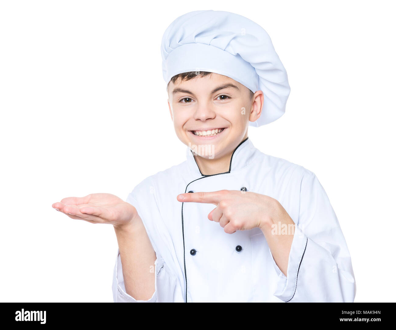 Teen boy wearing chef uniform Stock Photo - Alamy
