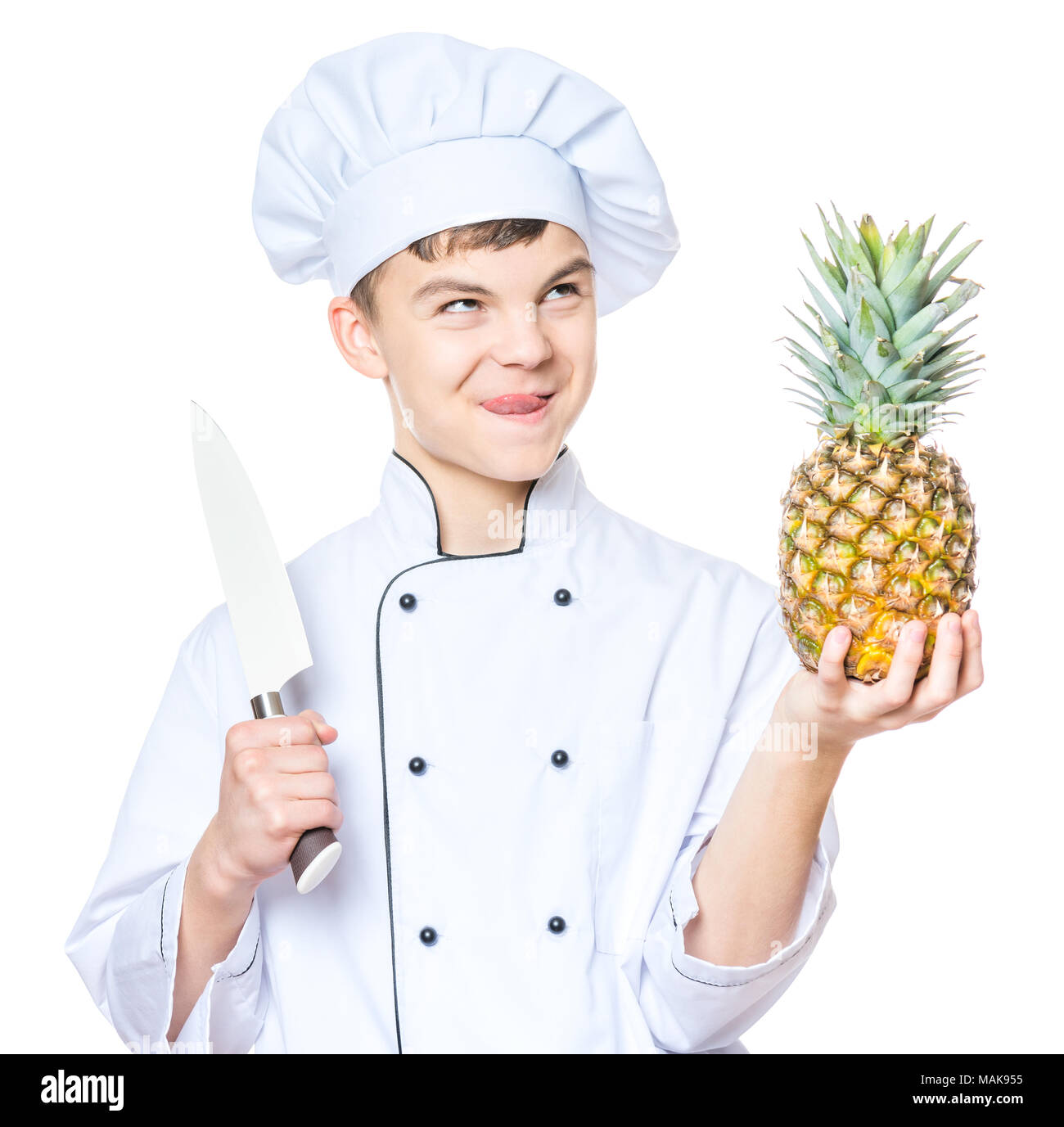 Teen boy wearing chef uniform Stock Photo - Alamy