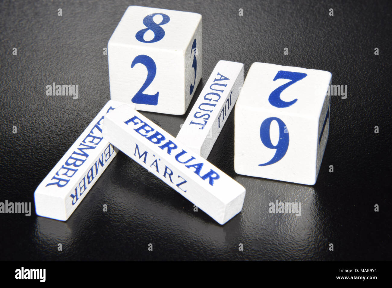 29th of February Date Dice - Calendar Cubes on Black Floor Reflecting ...