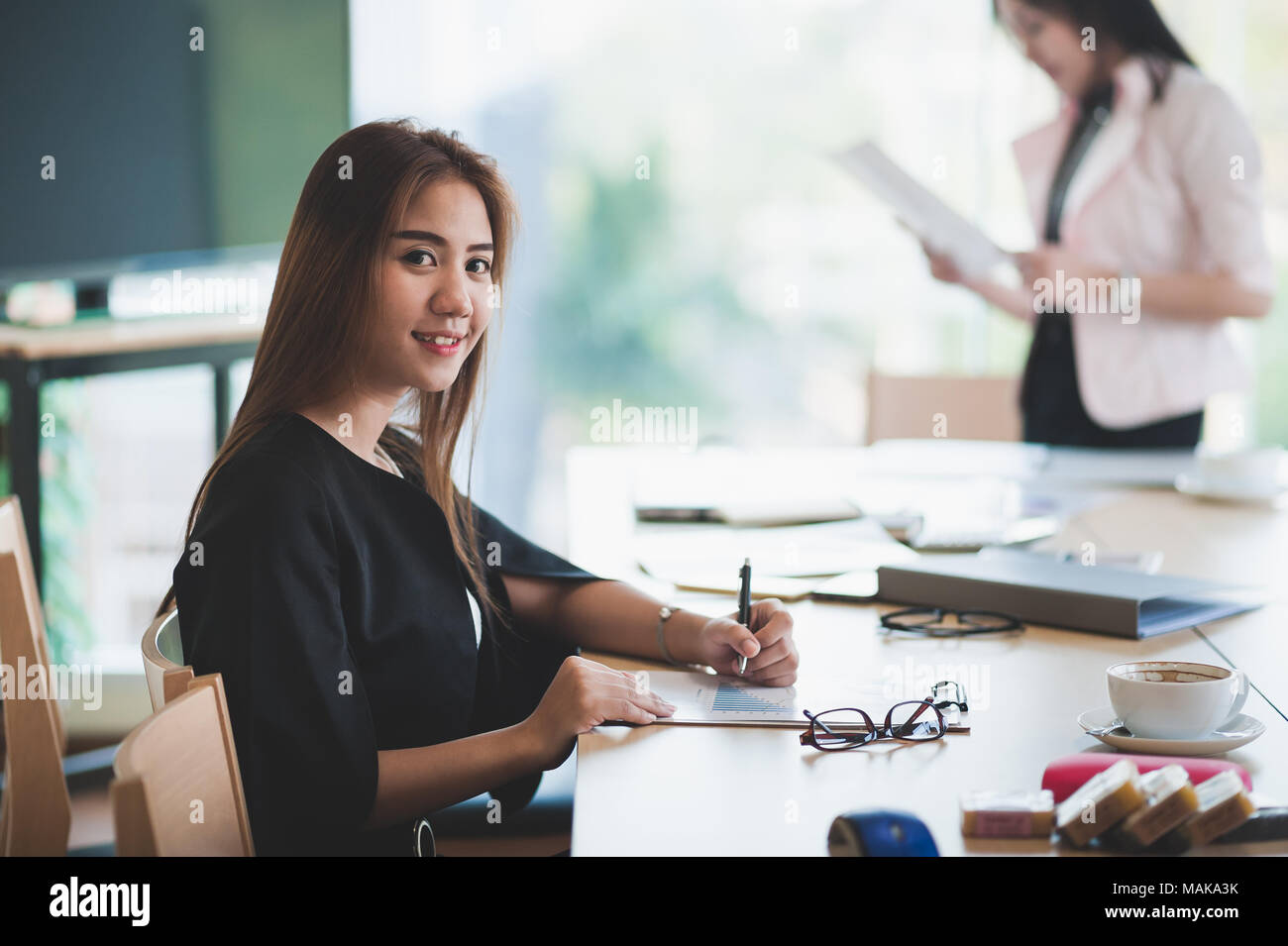 Asian secretary hi-res stock photography and images - Alamy