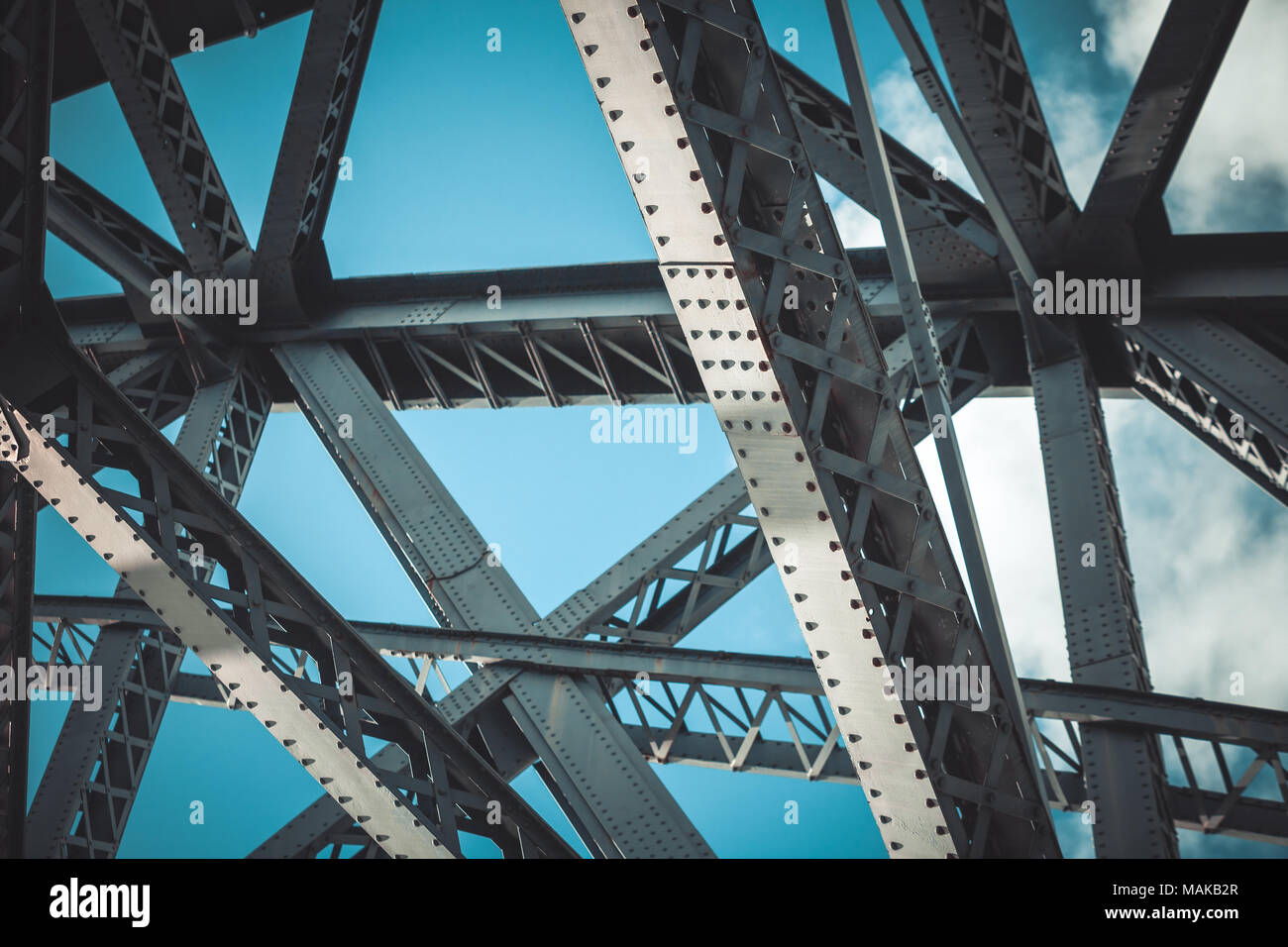Bridge frame closeup on blue sky background. Horizontal toned image ...