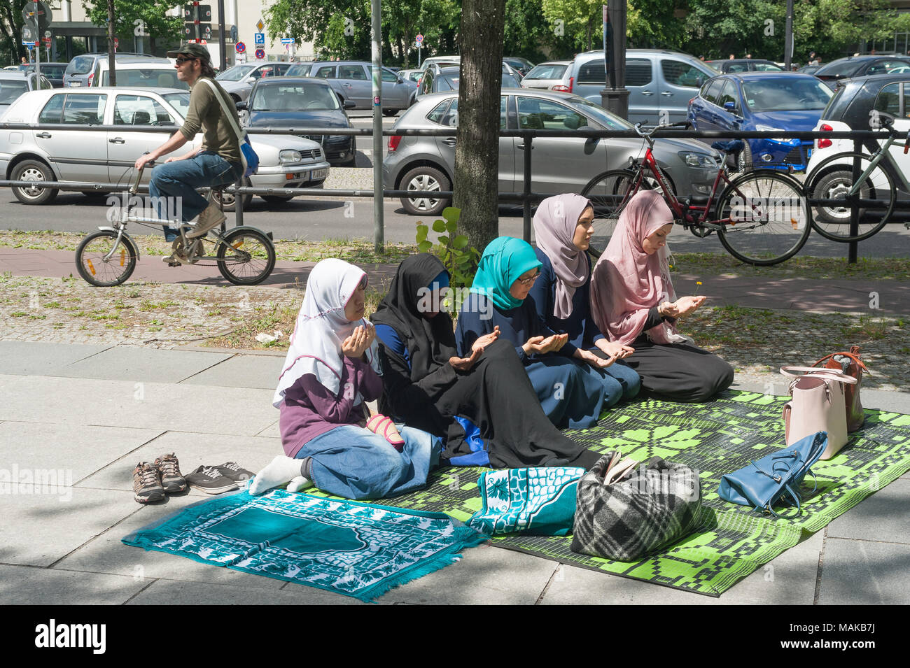 Berlin, Germany, Muslims participate in traditional Friday prayers ...