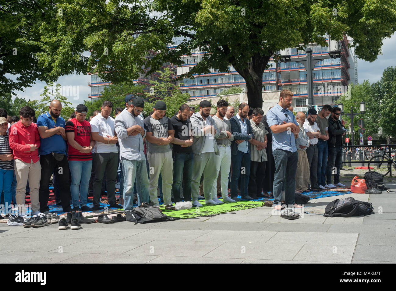 Berlin, Germany, Muslims participate in traditional Friday prayers ...
