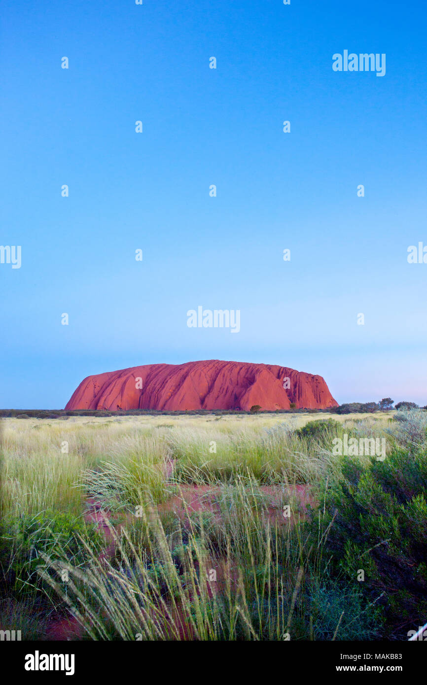 Uluru, also known as Ayers Rock is a large sandstone rock in the ...