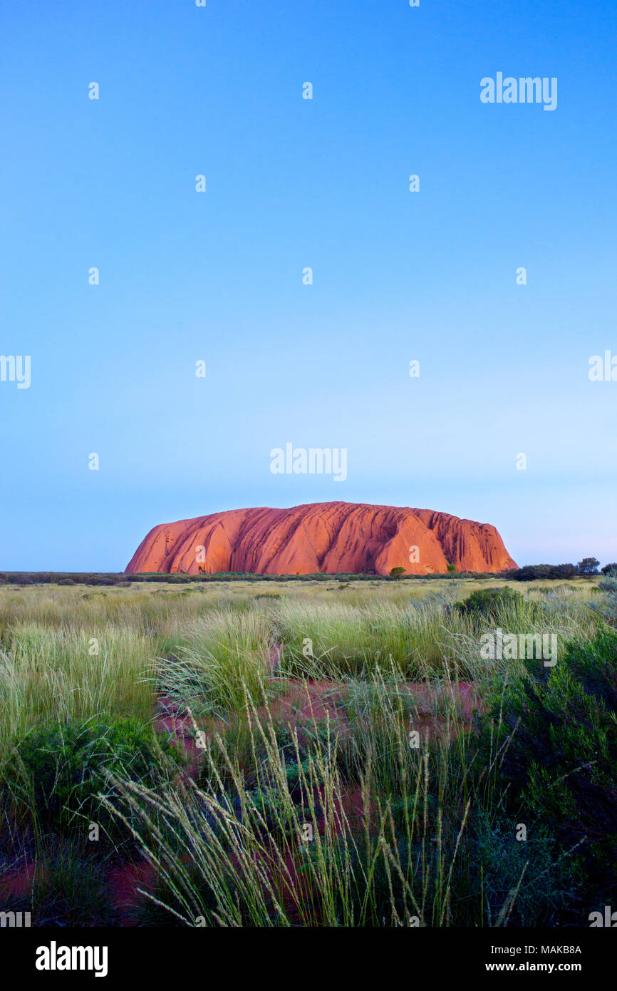 Uluru, also known as Ayers Rock is a large sandstone rock in the ...