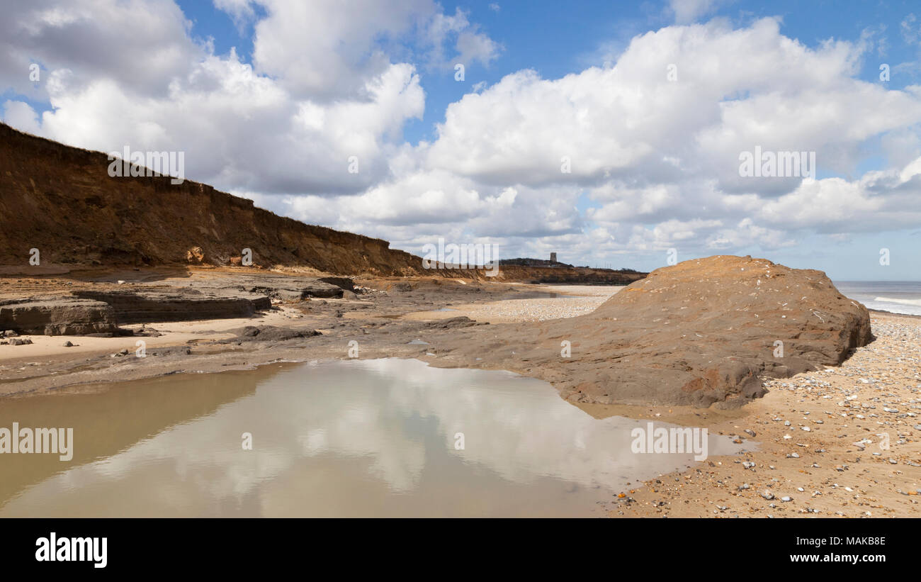 Crumbling cliffs in spring at Happisburgh Beach in Norfolk England UK ...