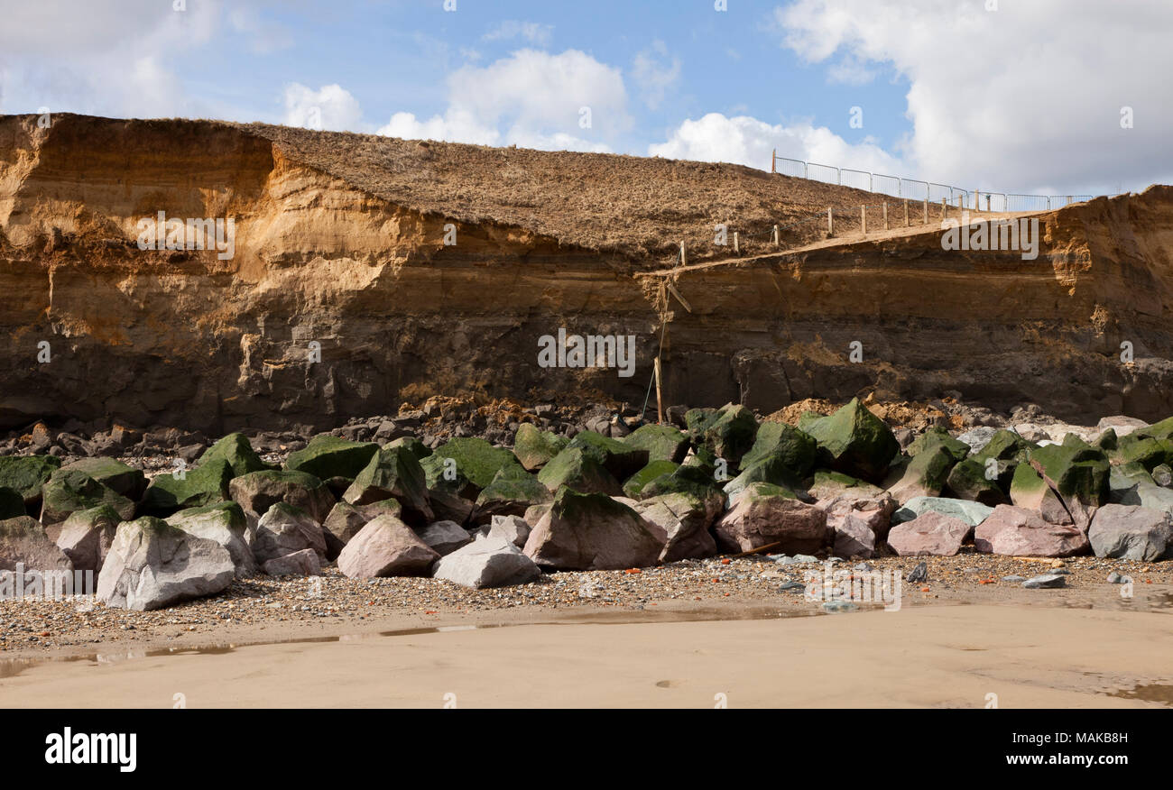 Crumbling cliffs in spring at Happisburgh Beach in Norfolk England UK ...