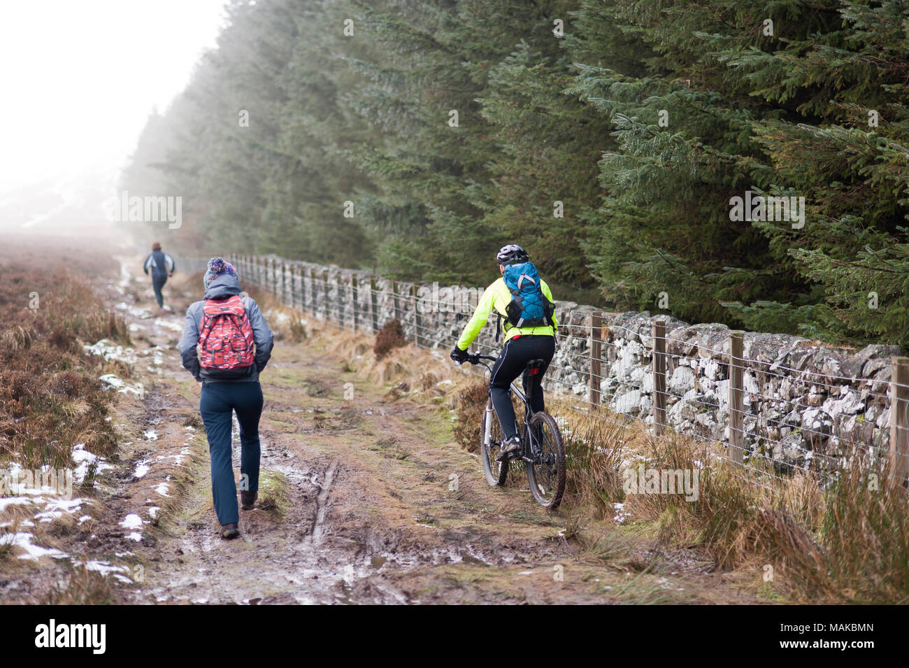 People enjoying the outdoors on a cold and wet afternoon Stock Photo ...